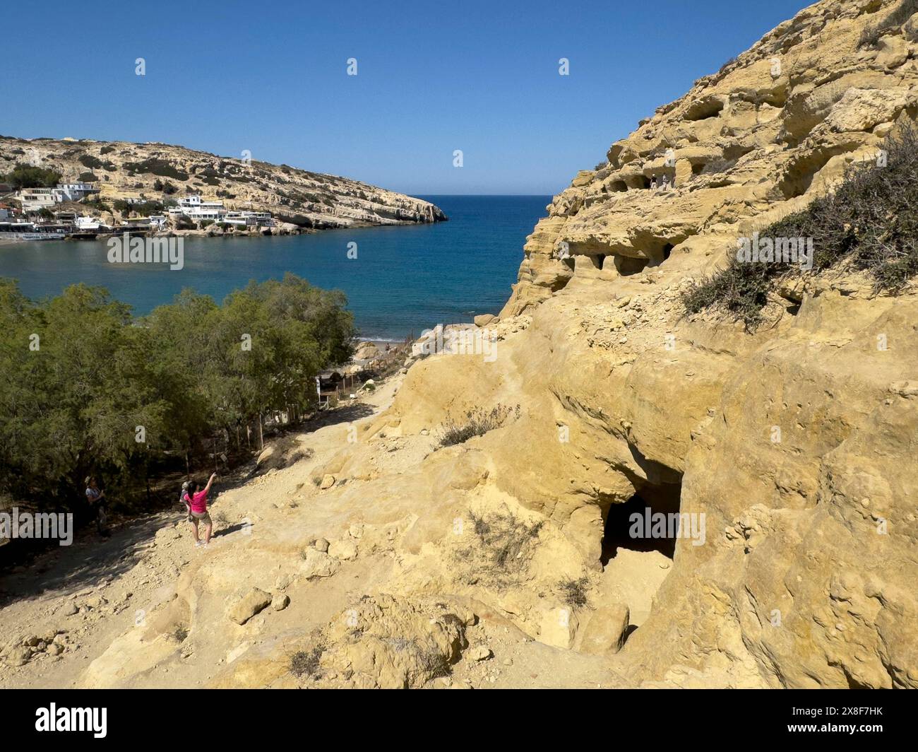View of entrances of caves in sandstone rocks of former Roman ...