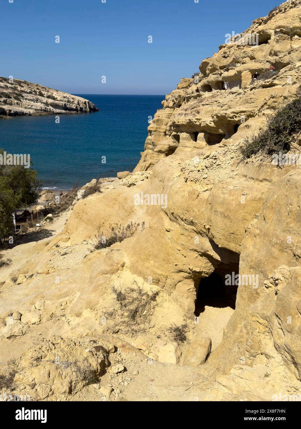 View of entrances of caves in sandstone rocks of former Roman ...