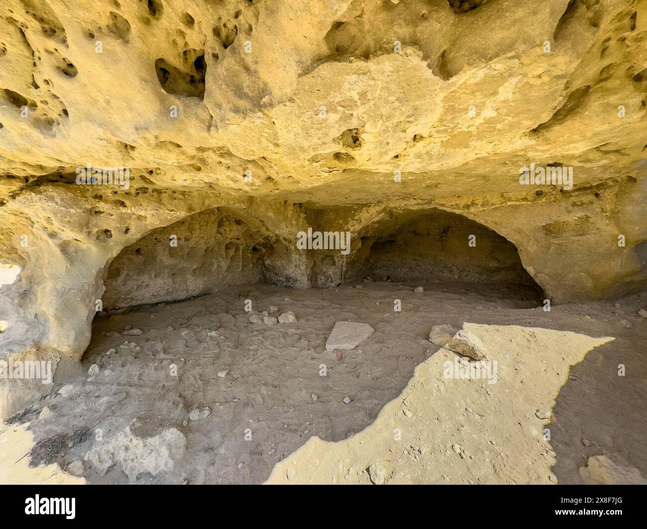Cave of former Roman necropolis with burial caves carved in sandstone ...
