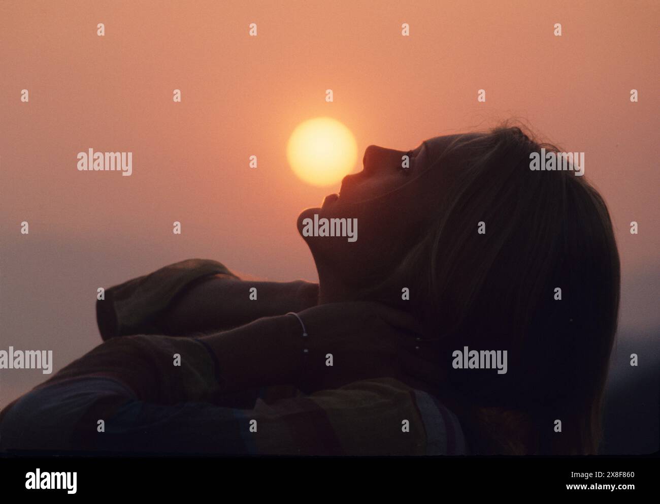 close up profile portrait with sunset background female evocation ...