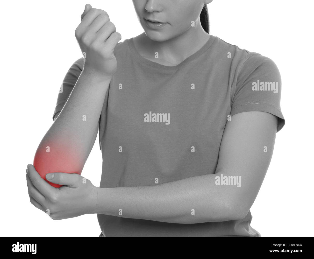 Woman suffering from pain in elbow, closeup. Black and white effect ...