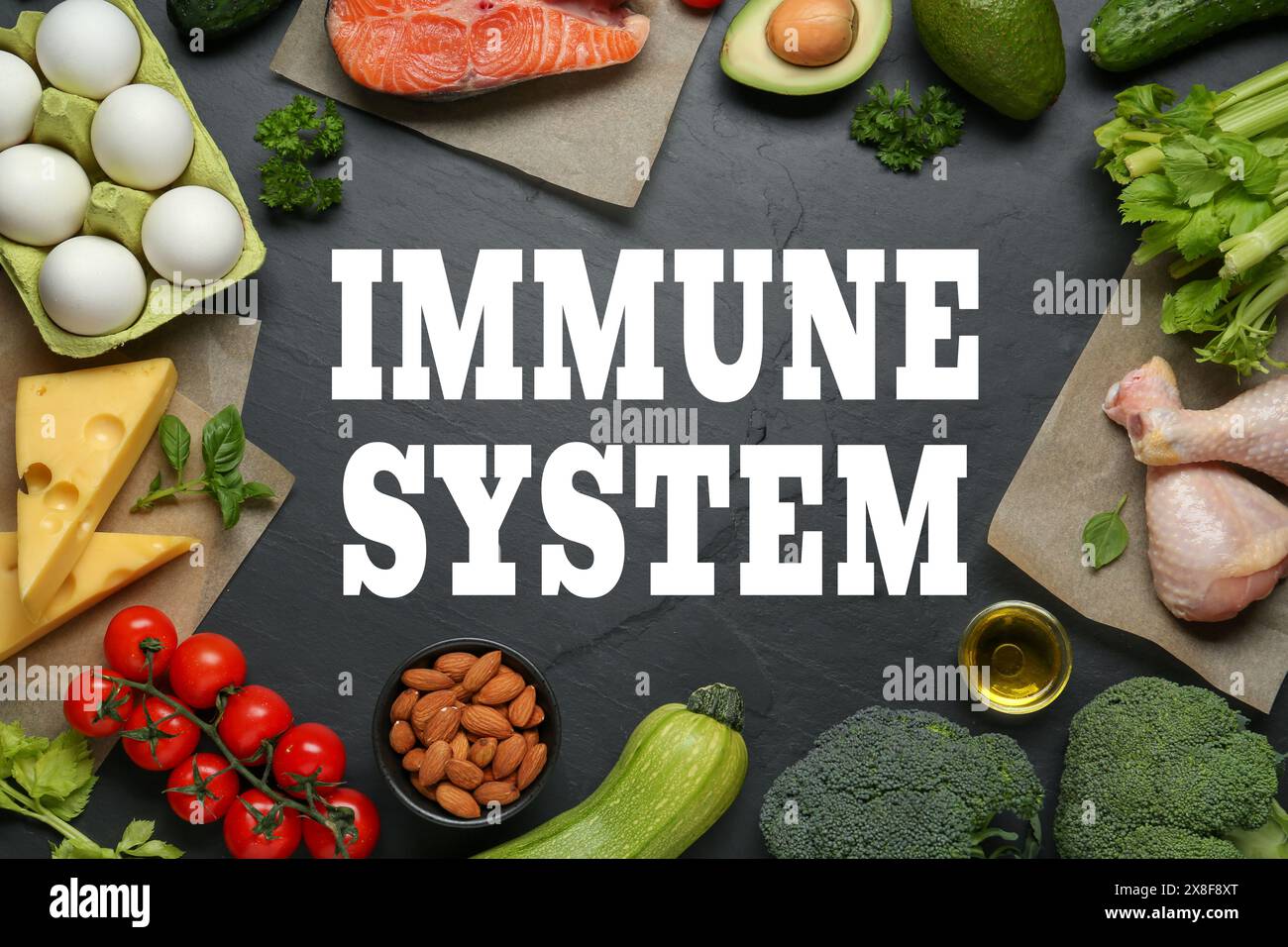 Immune system boosting with proper nutrition. Different foods on black ...