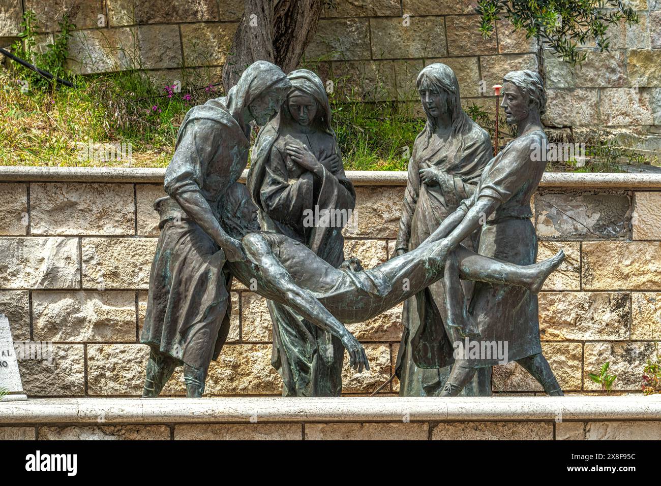 The episodes of Christ's calarion are told with bronze sculptures along ...