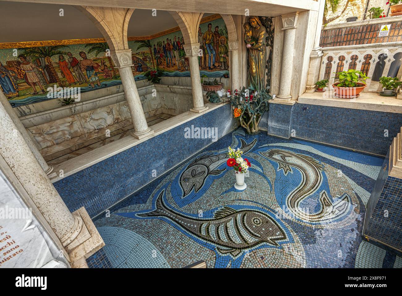 The basin with mosaics that collects the water from the holy spring ...