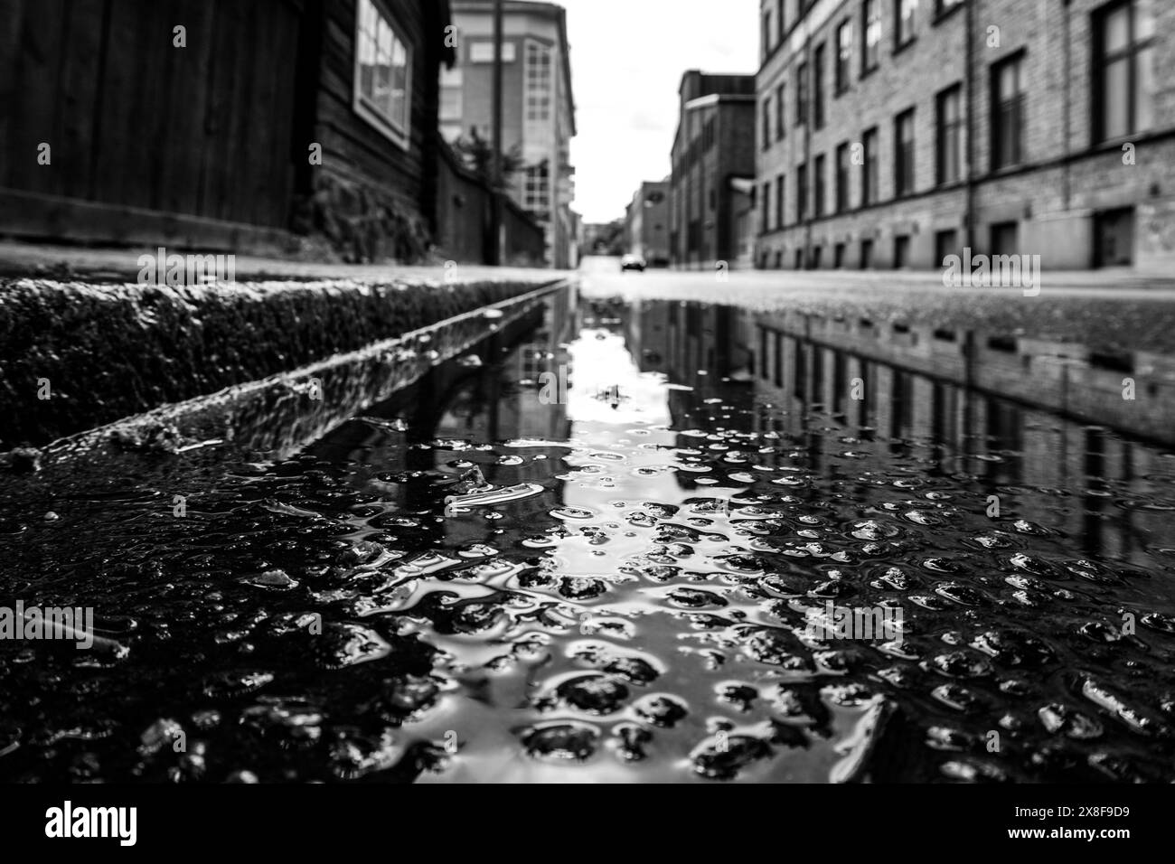 Photo of puddle Black and White Stock Photos & Images - Alamy