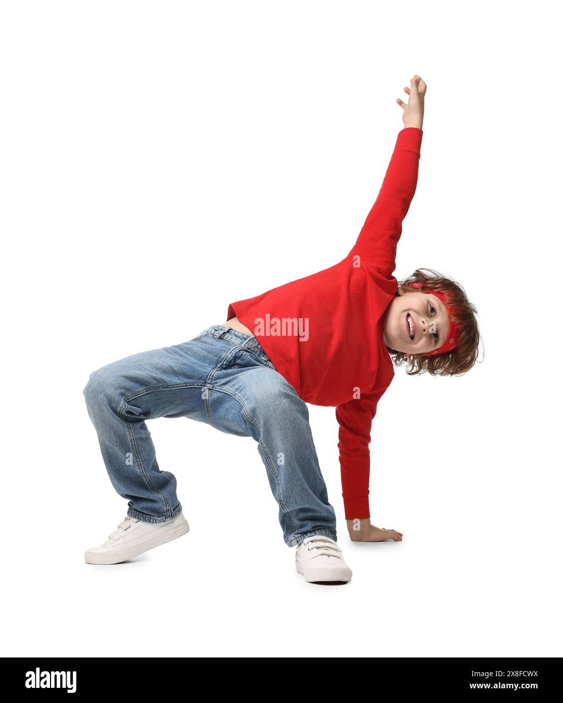 Happy little boy dancing on white background Stock Photo - Alamy