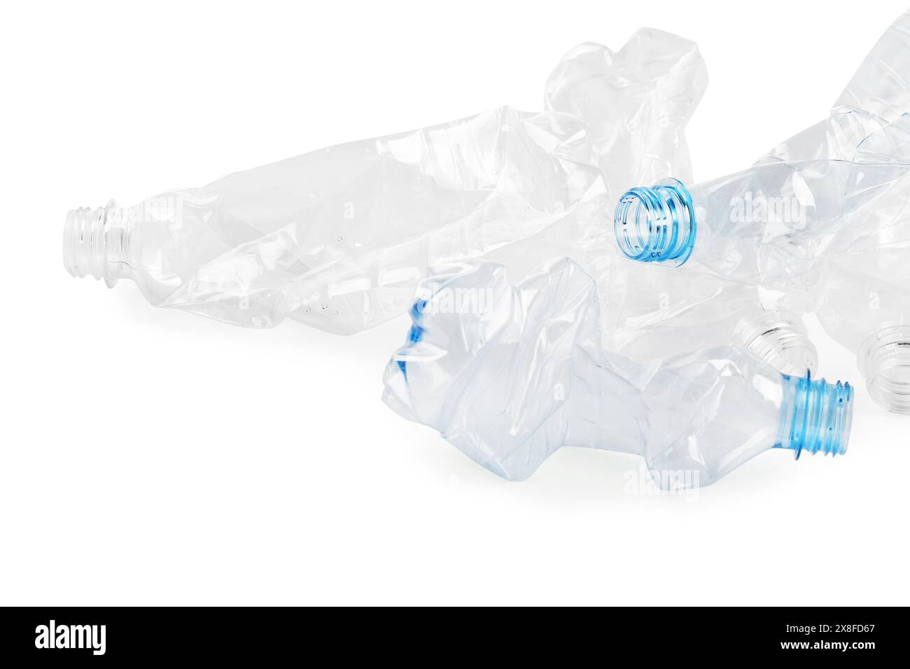 Crumpled disposable plastic bottles on white background Stock Photo - Alamy