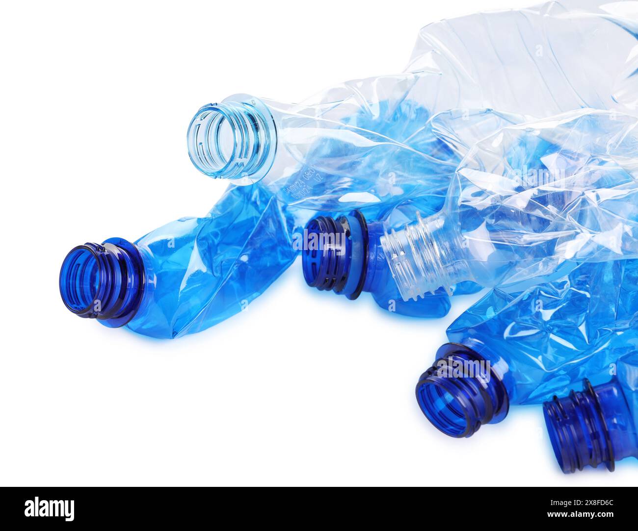 Crumpled disposable plastic bottles on white background Stock Photo - Alamy