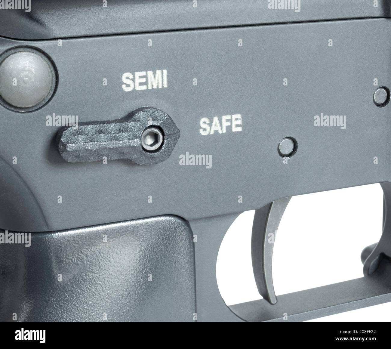 Ambidextrous safety selector on an AR-15 in the safe position with the ...