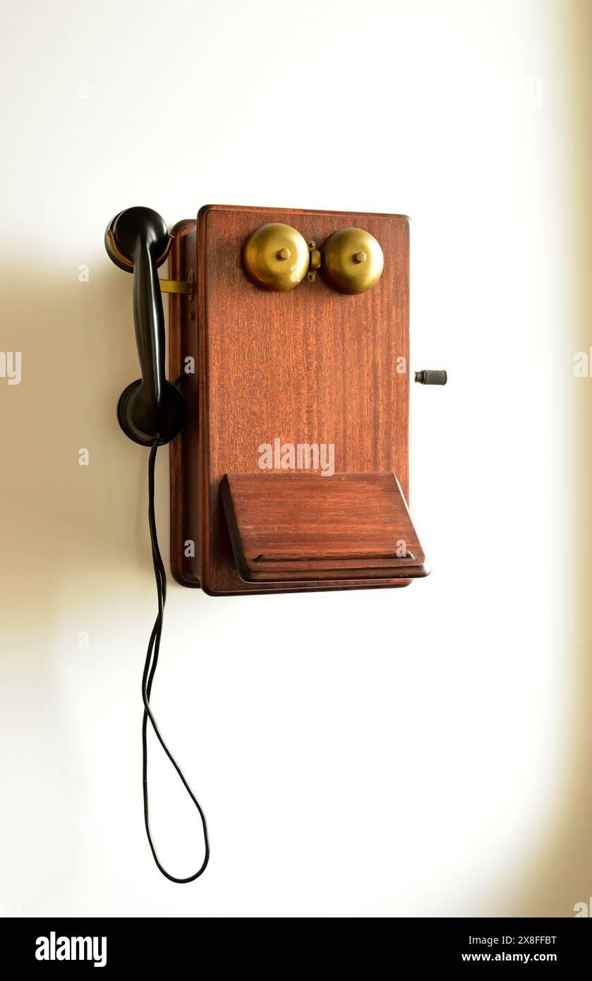 Vintage wall mounted telephone box Stock Photo - Alamy