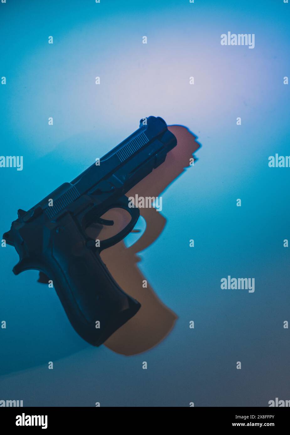 Pistol gun artistic photograph book cover design Stock Photo - Alamy