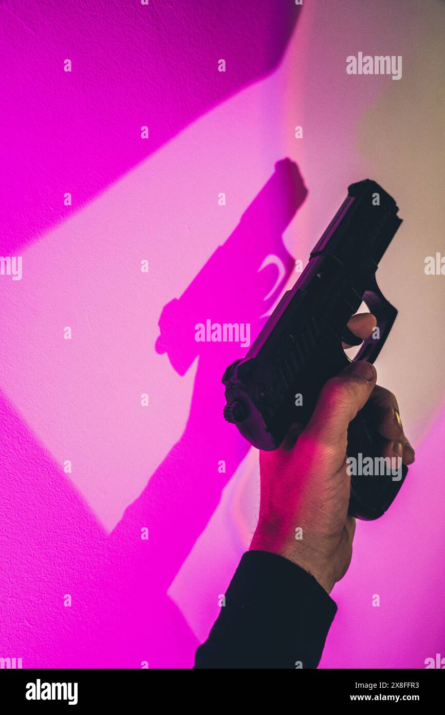 Pistol gun artistic photograph book cover design Stock Photo - Alamy