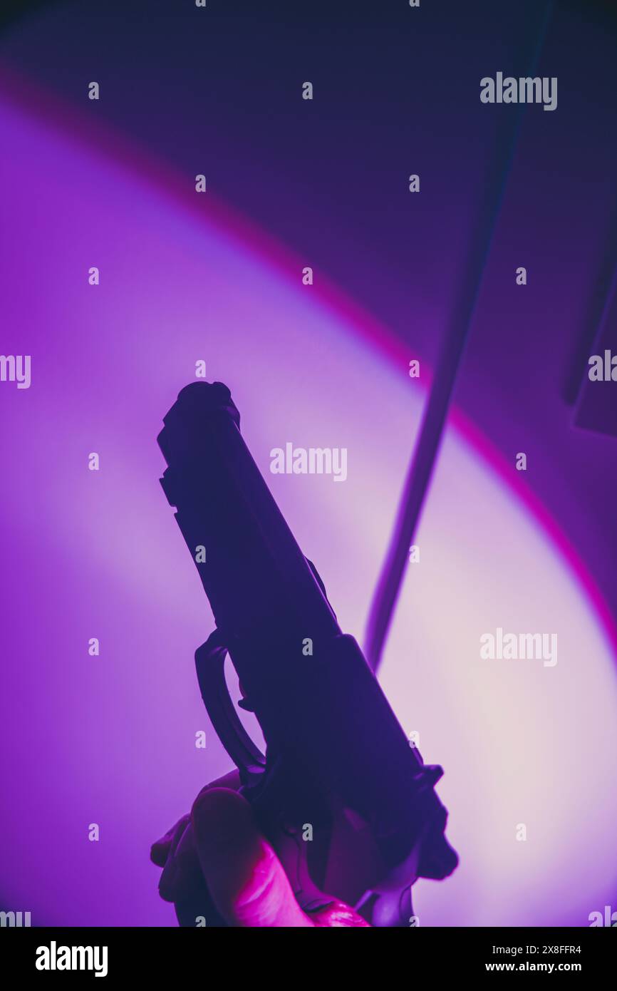 Pistol gun artistic photograph book cover design Stock Photo - Alamy