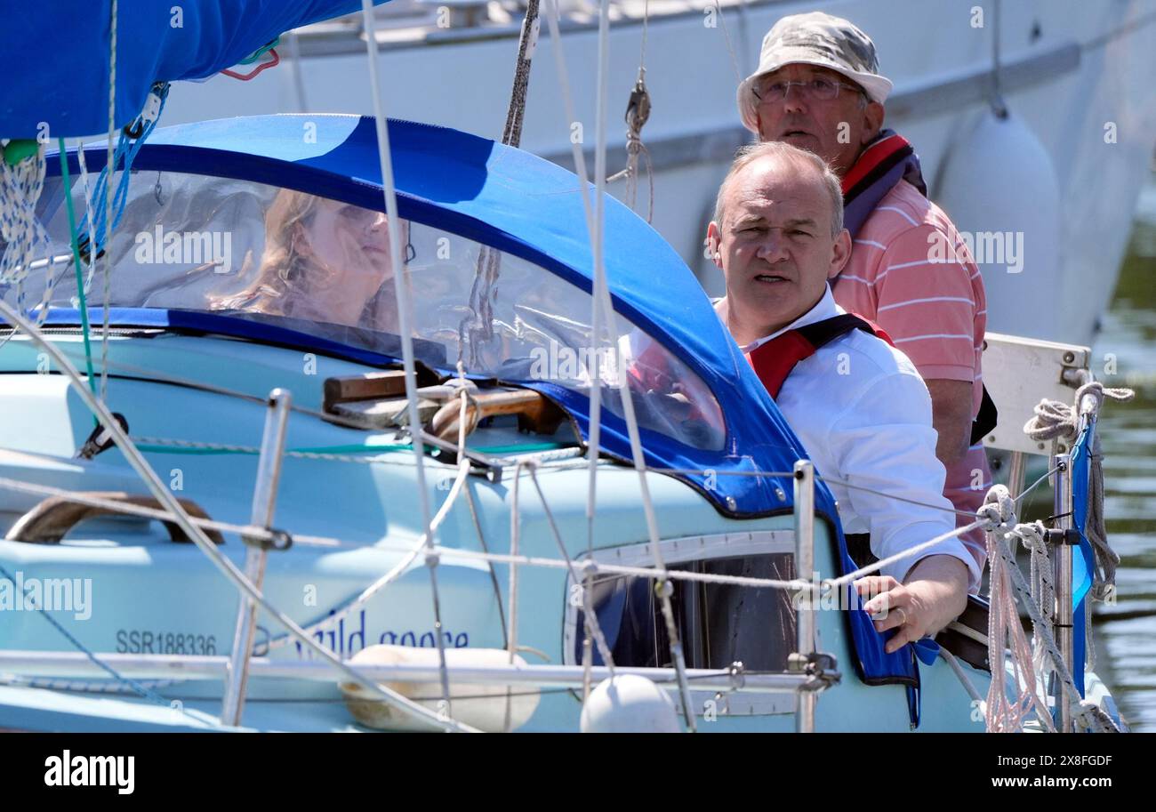 Liberal Democrat leader Sir Ed Davey (centre) takes a boat trip during ...