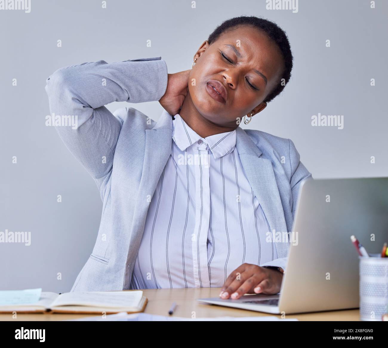 Office, business and black woman with neck pain, burnout and tired for ...