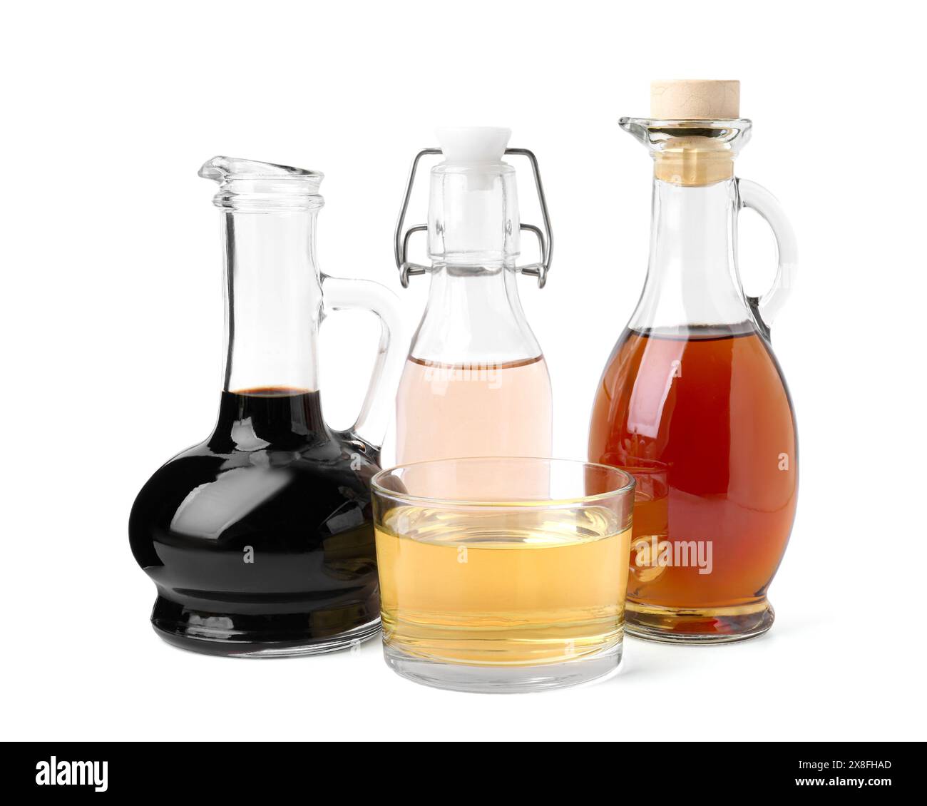 Different types of vinegar isolated on white Stock Photo - Alamy