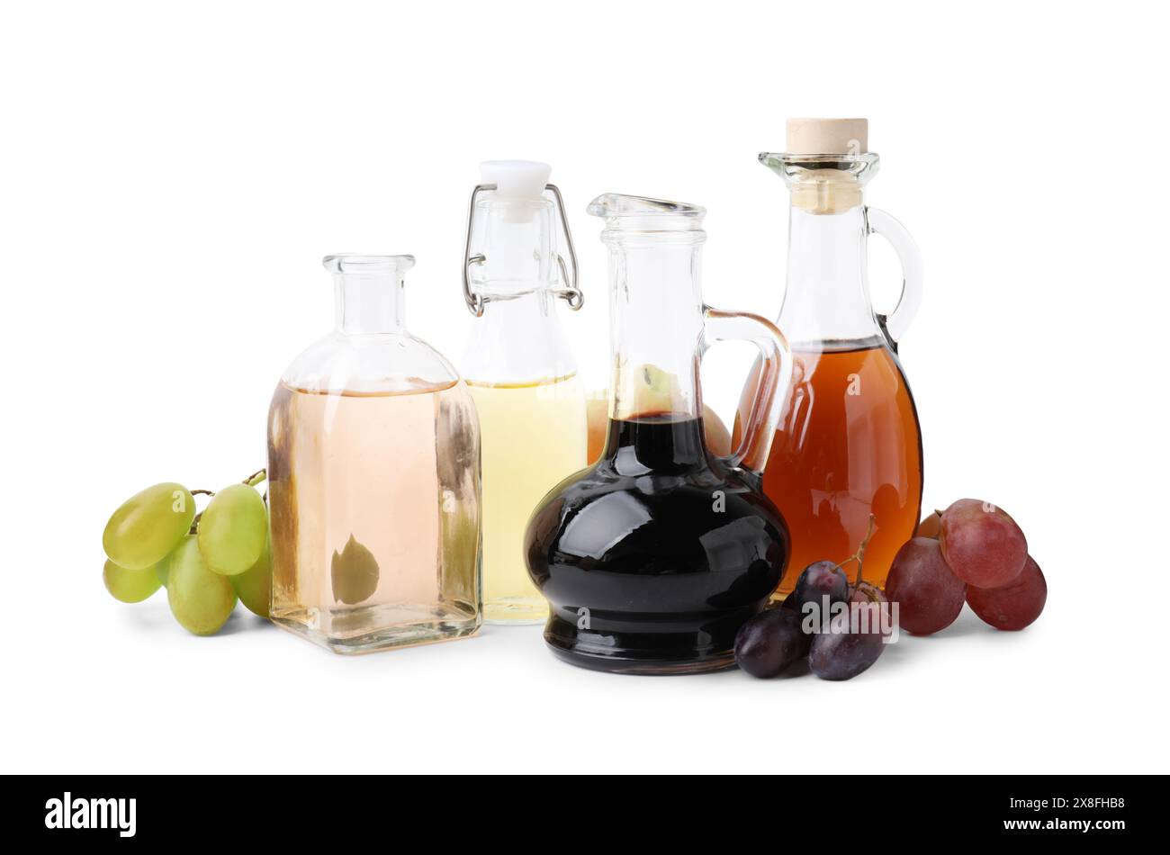 Different types of vinegar and ingredients isolated on white Stock ...