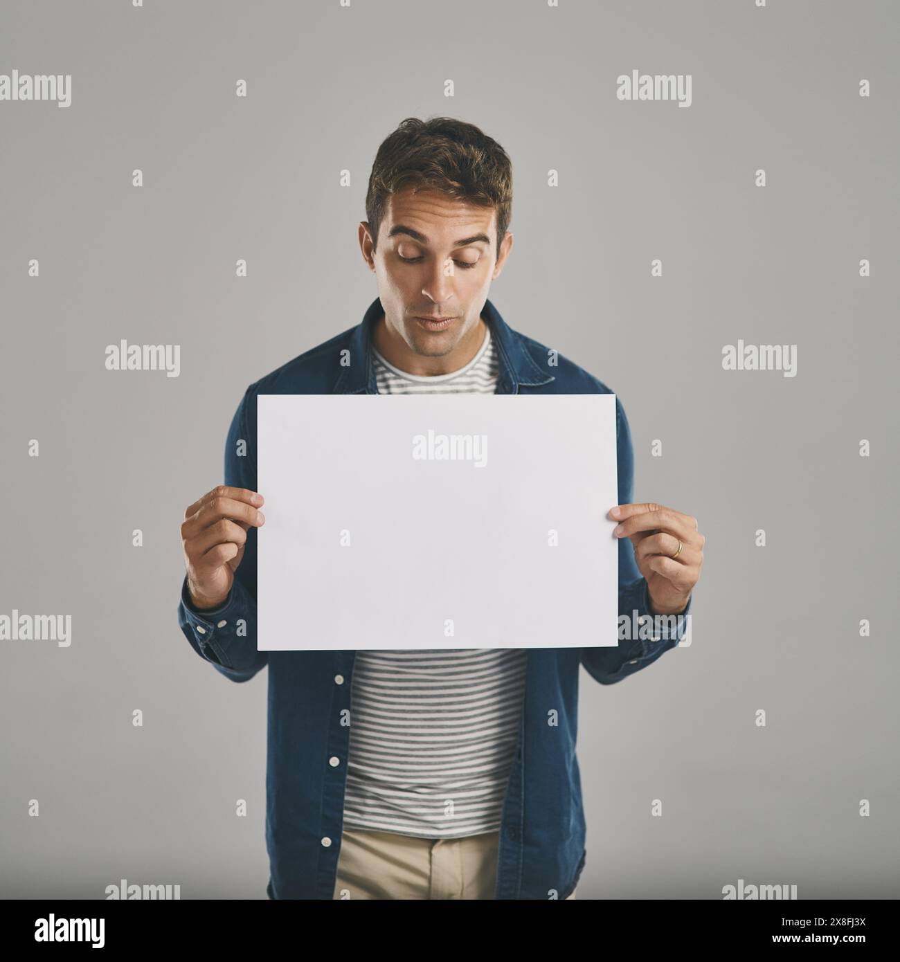 Man, poster and promotion mockup in studio or announcement placard ...