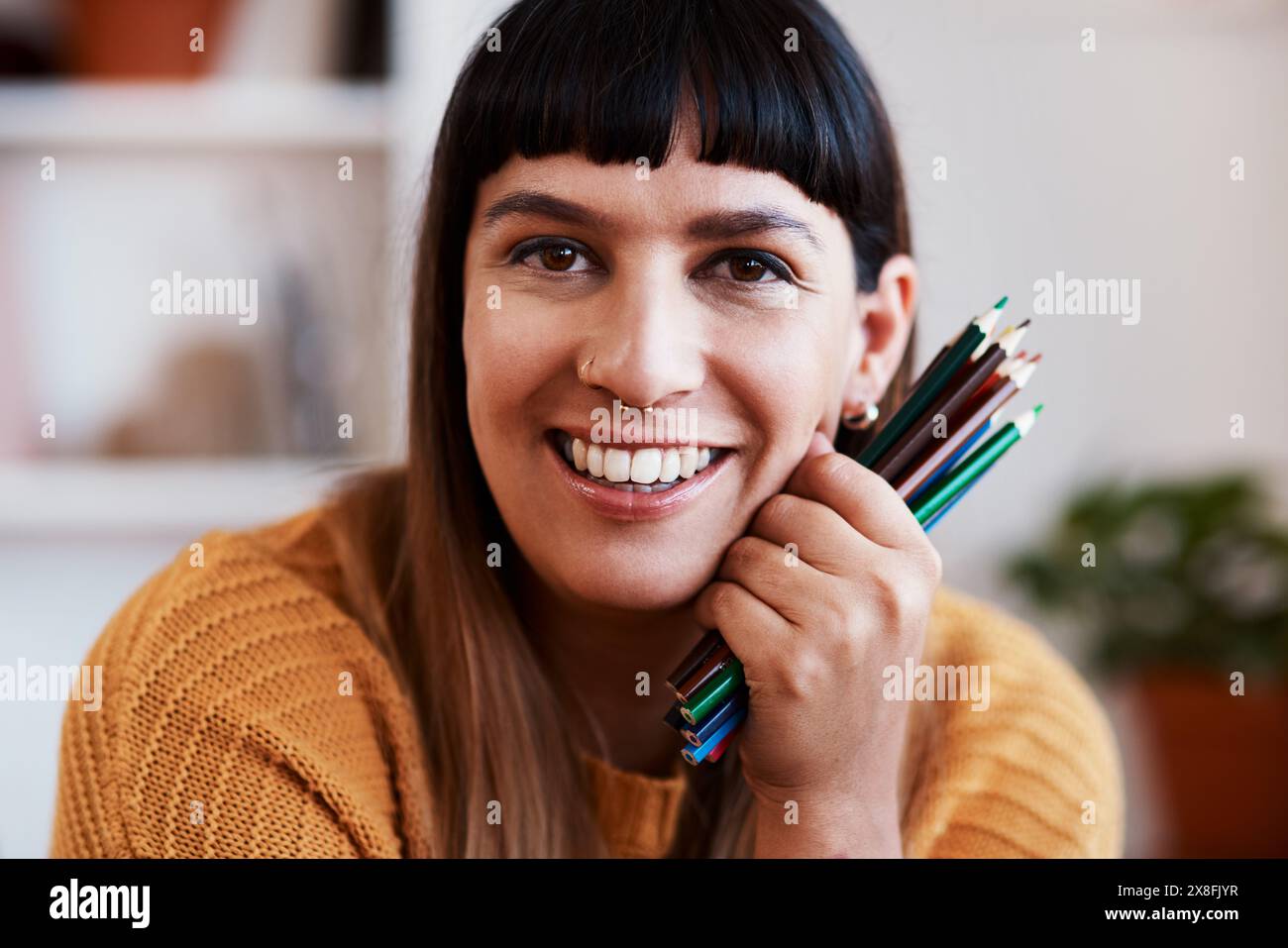 Woman, portrait and happy artist thinking, sketching and comfortable ...