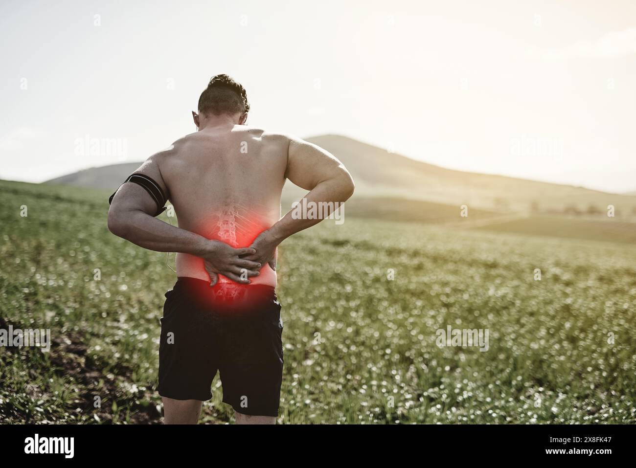 Outdoor, man and back pain with injury, accident or muscle tension as ...