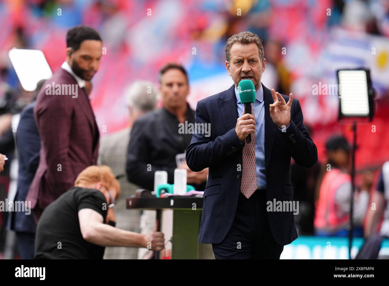 TV Sport presenter Mark Pougatch ahead during the Emirates FA Cup final ...