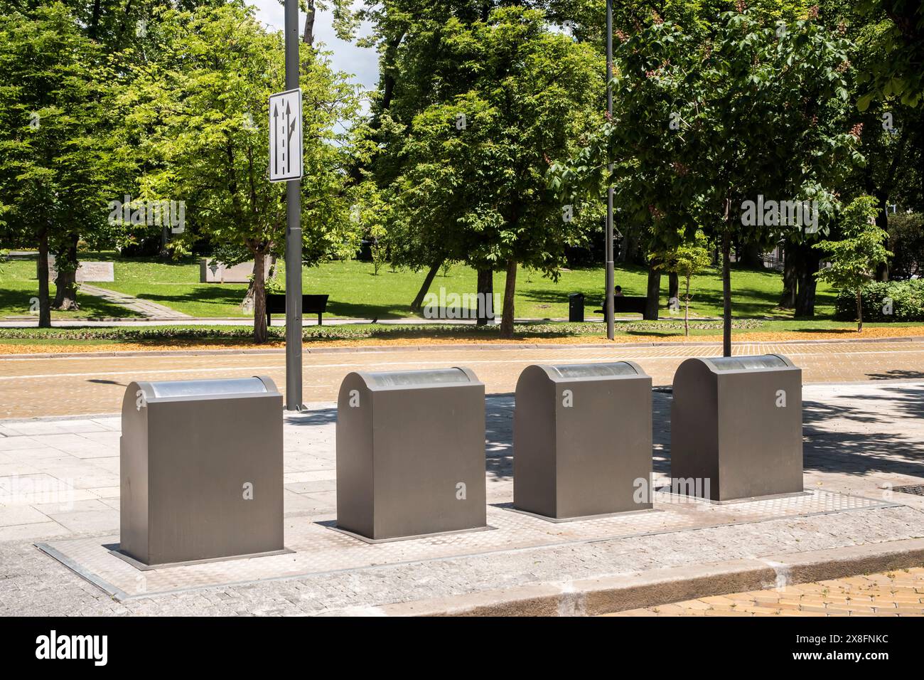 Modern underground trash containers in city area Stock Photo - Alamy