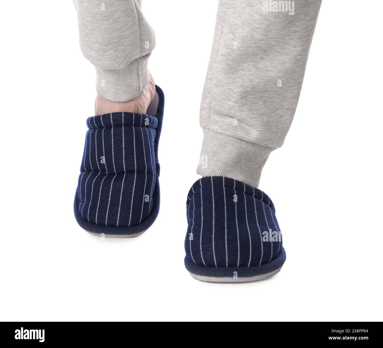 Man in soft slippers on white background, closeup Stock Photo - Alamy