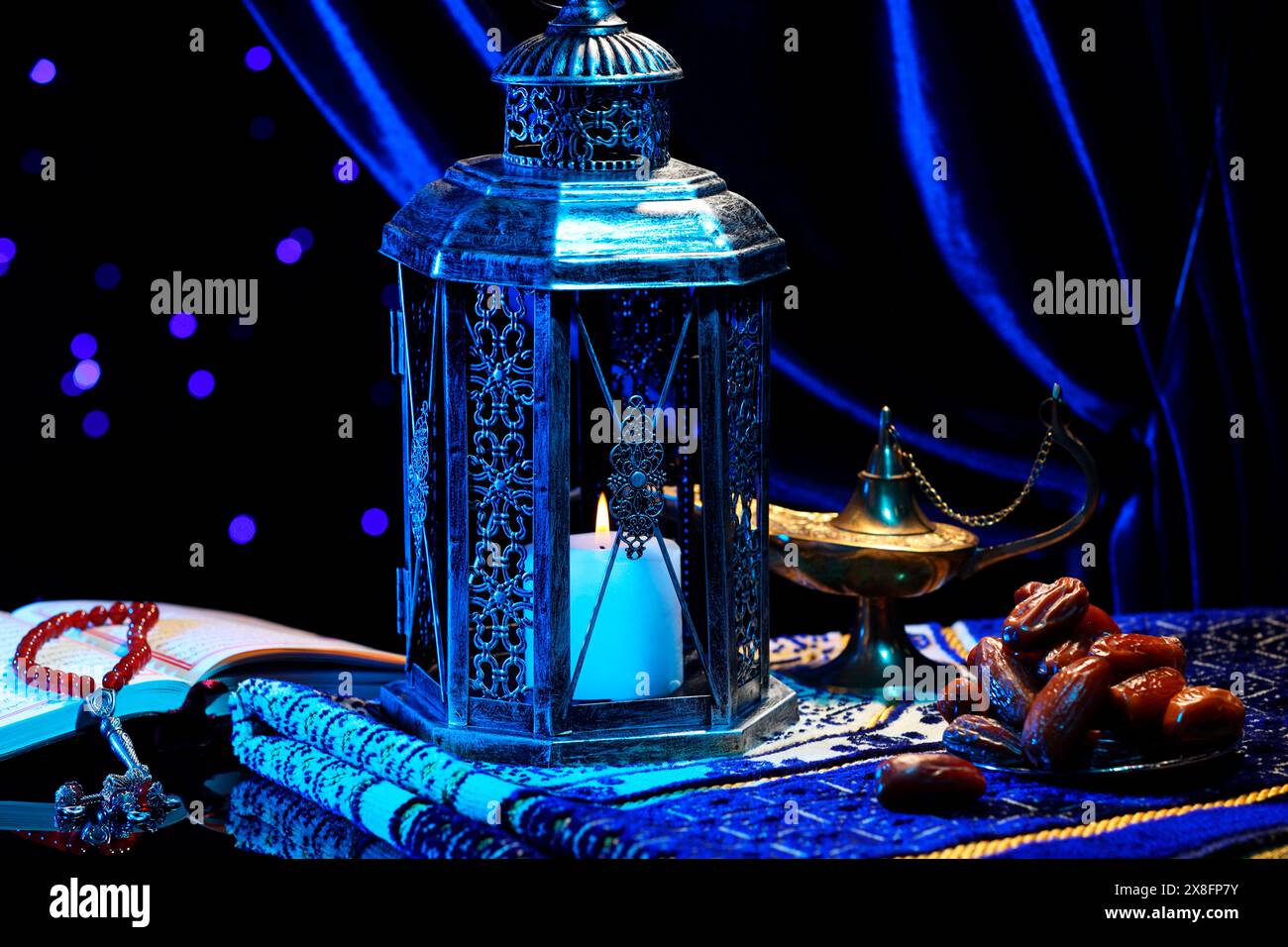 Arabic lantern, Quran, misbaha, Aladdin magic lamp, dates and folded ...