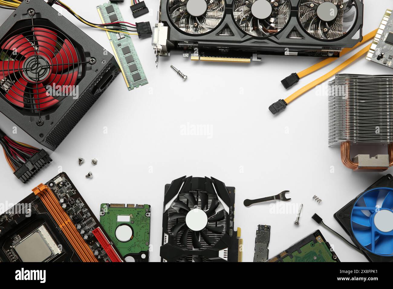 Frame of graphics card and other computer hardware on white background ...