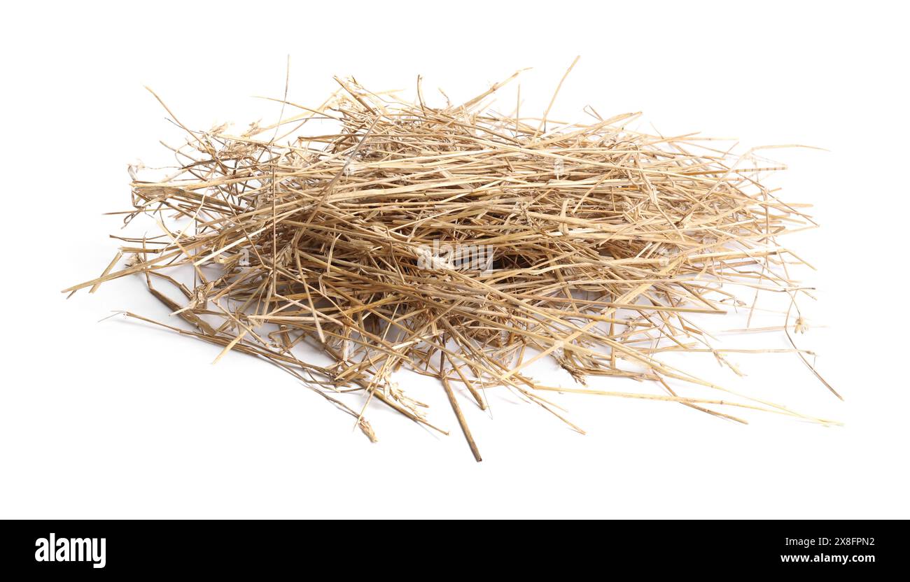 Dried straw isolated on white. Livestock feed Stock Photo - Alamy