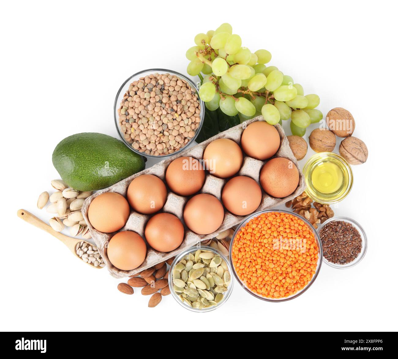 Different nuts, seeds and products high in healthy fats isolated on ...