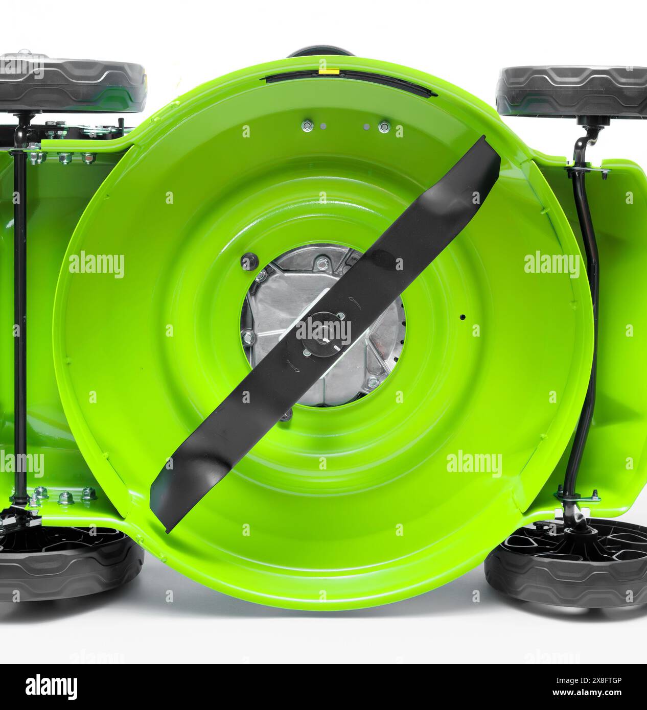 Brand new green color lawn mower bottom showing the cutting blade Stock ...