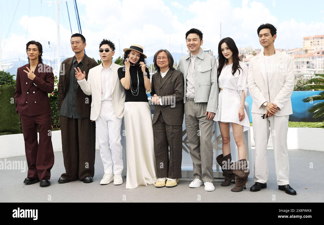Cannes, France. 25th May, 2024. Director Peter Ho-sun Chan (4th R) and cast members pose during ...