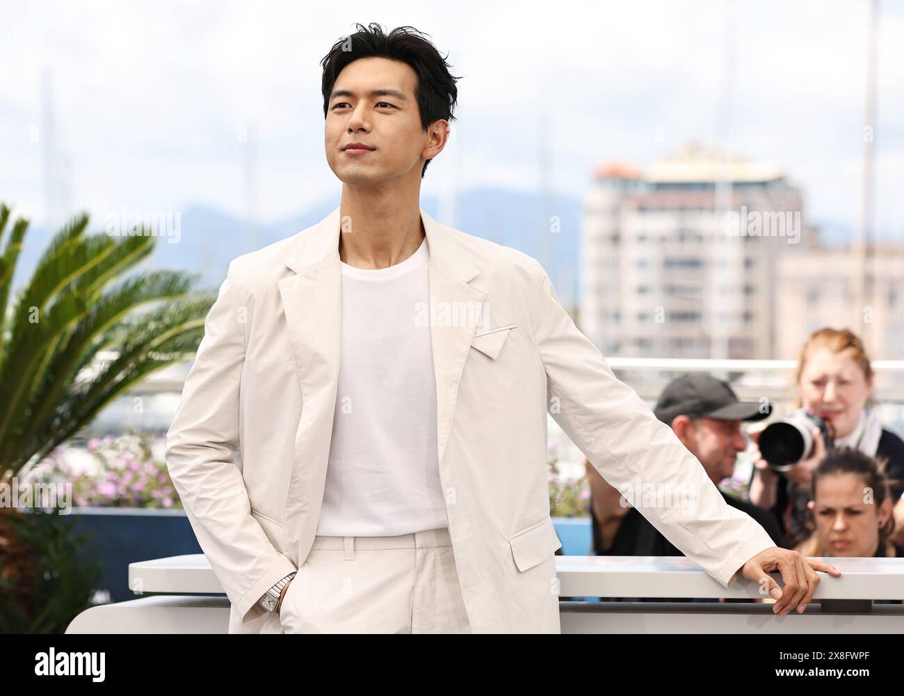 Cannes, France. 25th May, 2024. Actor Li Xian poses during a photocall ...