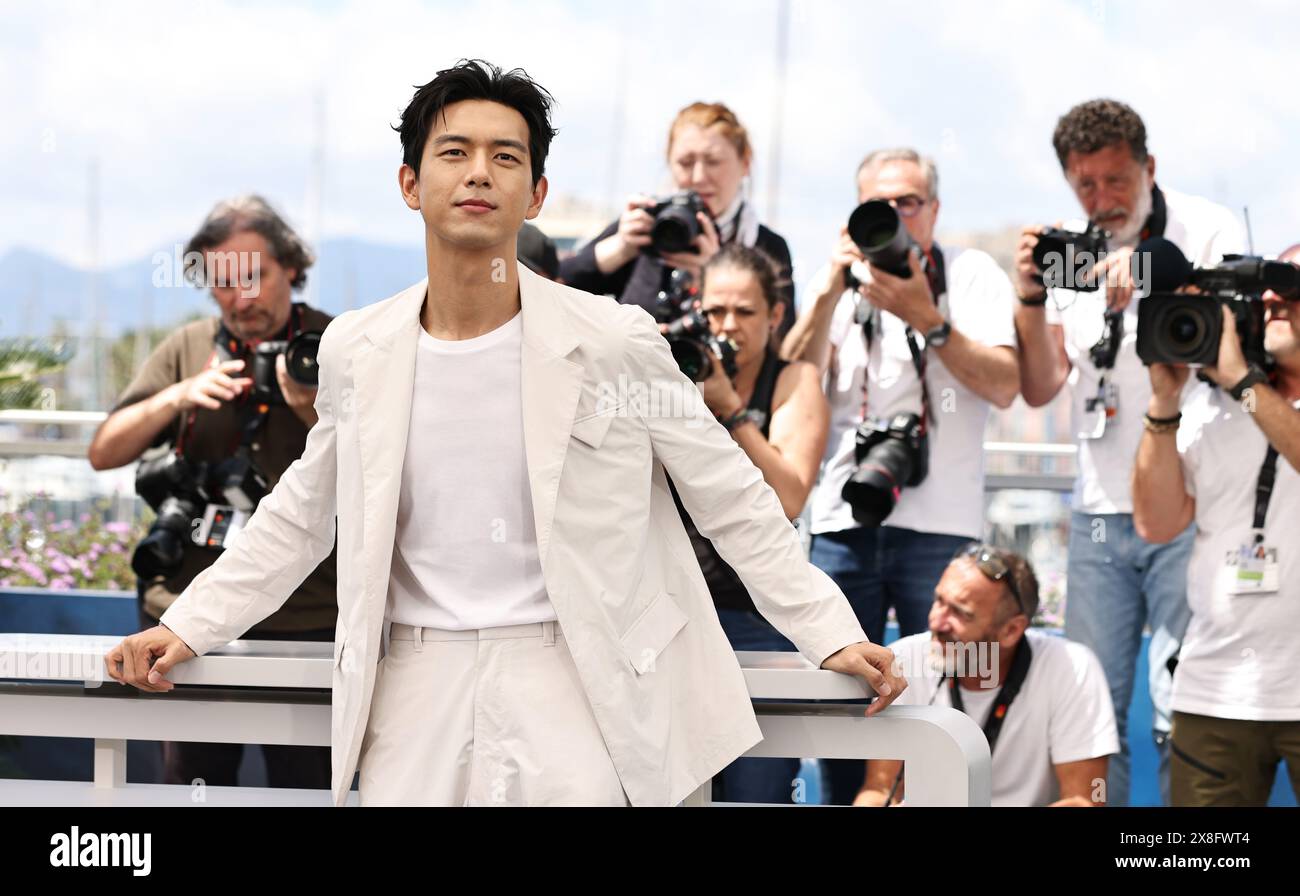 Cannes, France. 25th May, 2024. Actor Li Xian poses during a photocall ...