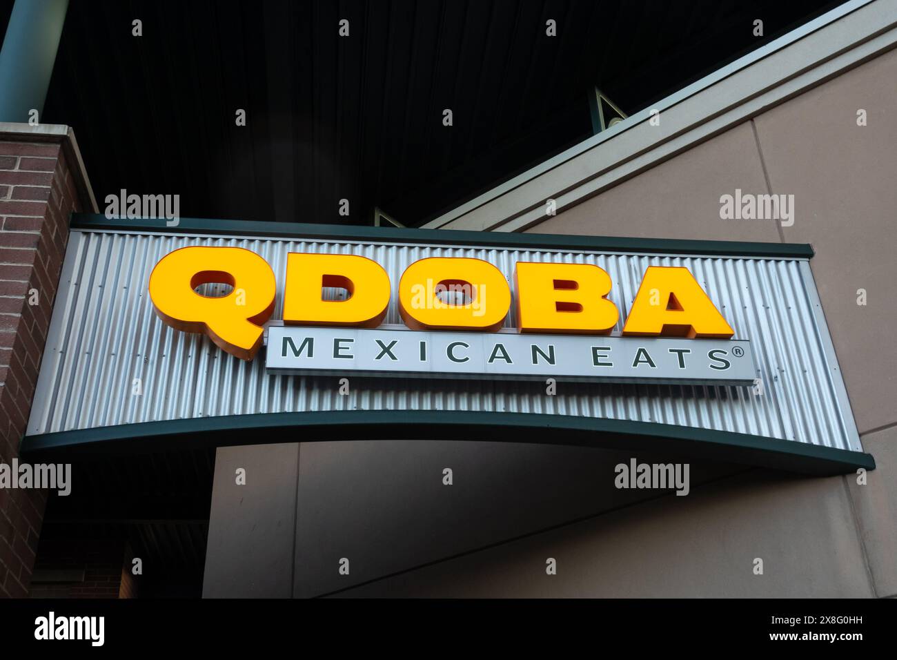 FORT COLLINS, CO, USA - MAY 12, 2024:Qdoba Mexican Eats exterior and ...
