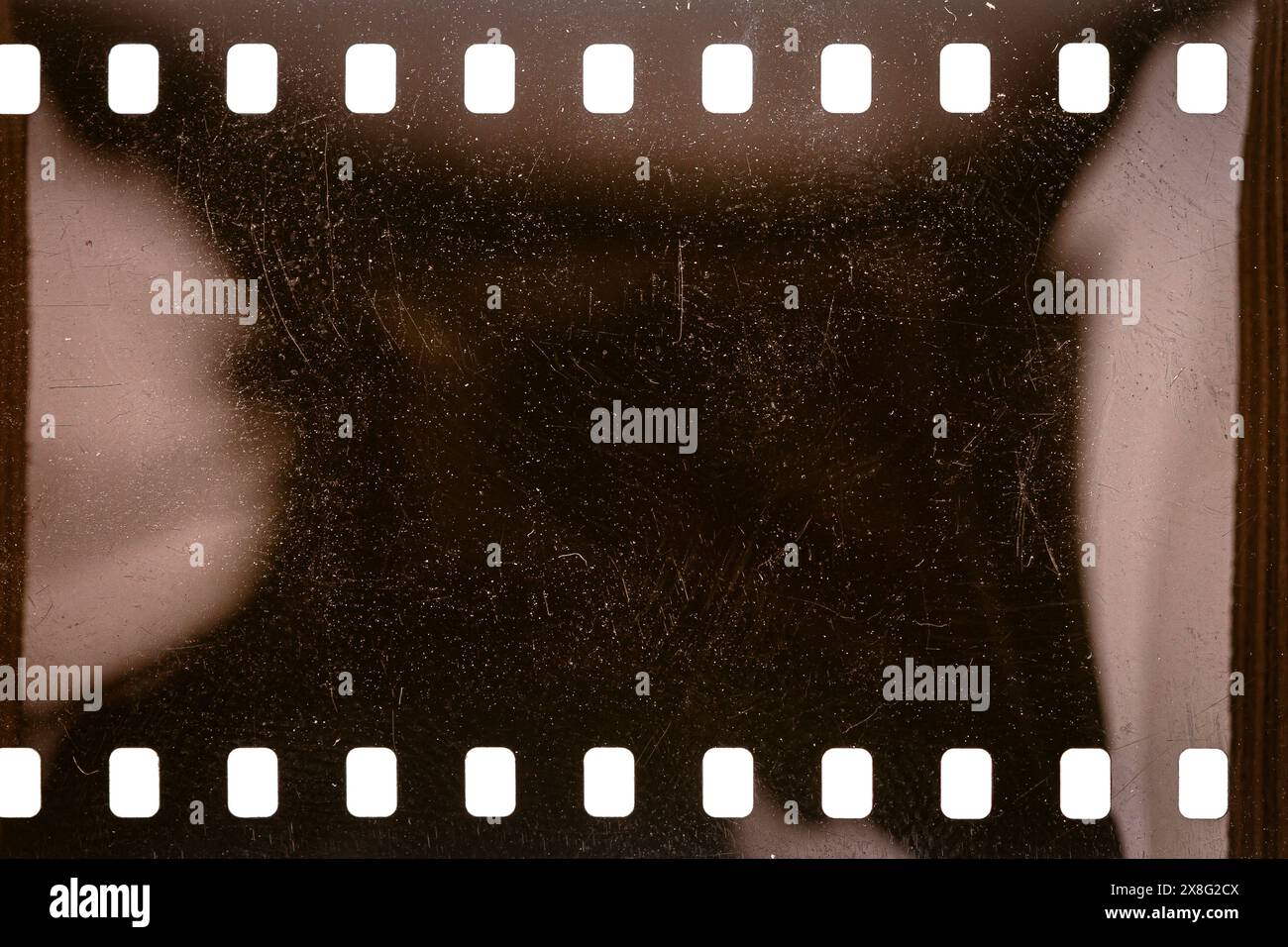 Dusty and grungy 35mm film texture or surface. Perforated scratched ...