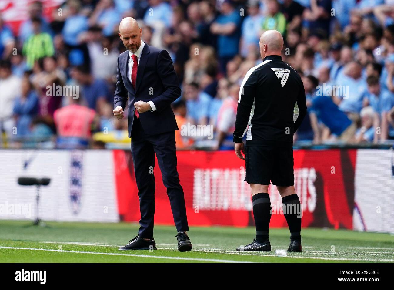 Manchester United manager Erik ten Hag celebrates after Kobbie Mainoo ...