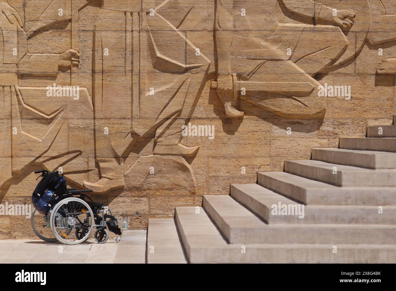 Wheelchair left behind at the base of stairs due to lack of ...