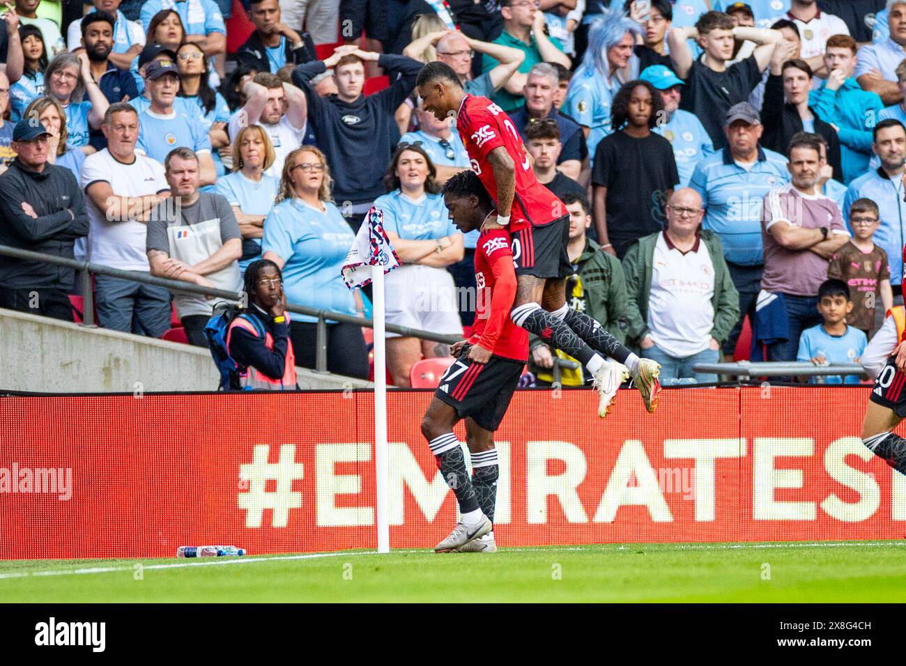 Kobbie Mainoo #37 of Manchester United celebrates his goal during the ...