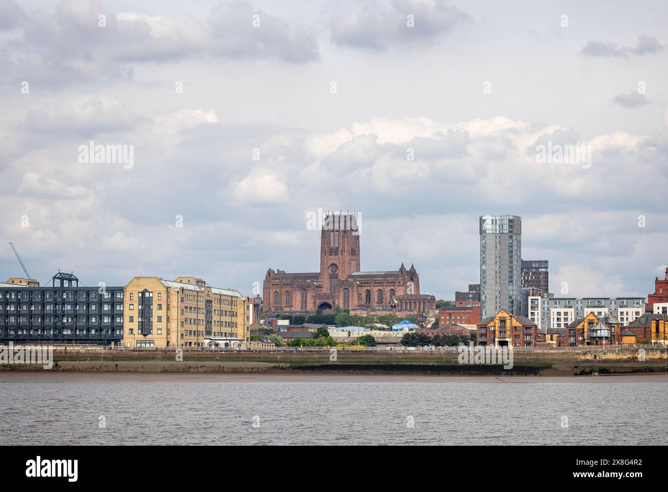 The Anglican Liverpool Cathedral and city skyline seen from the River ...