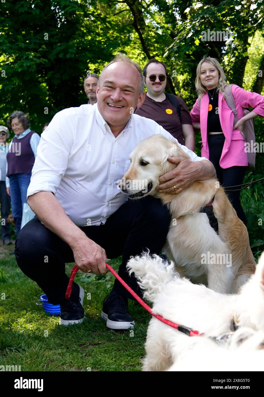 Liberal Democrat leader Sir Ed Davey joins supporters for a dog walk ...