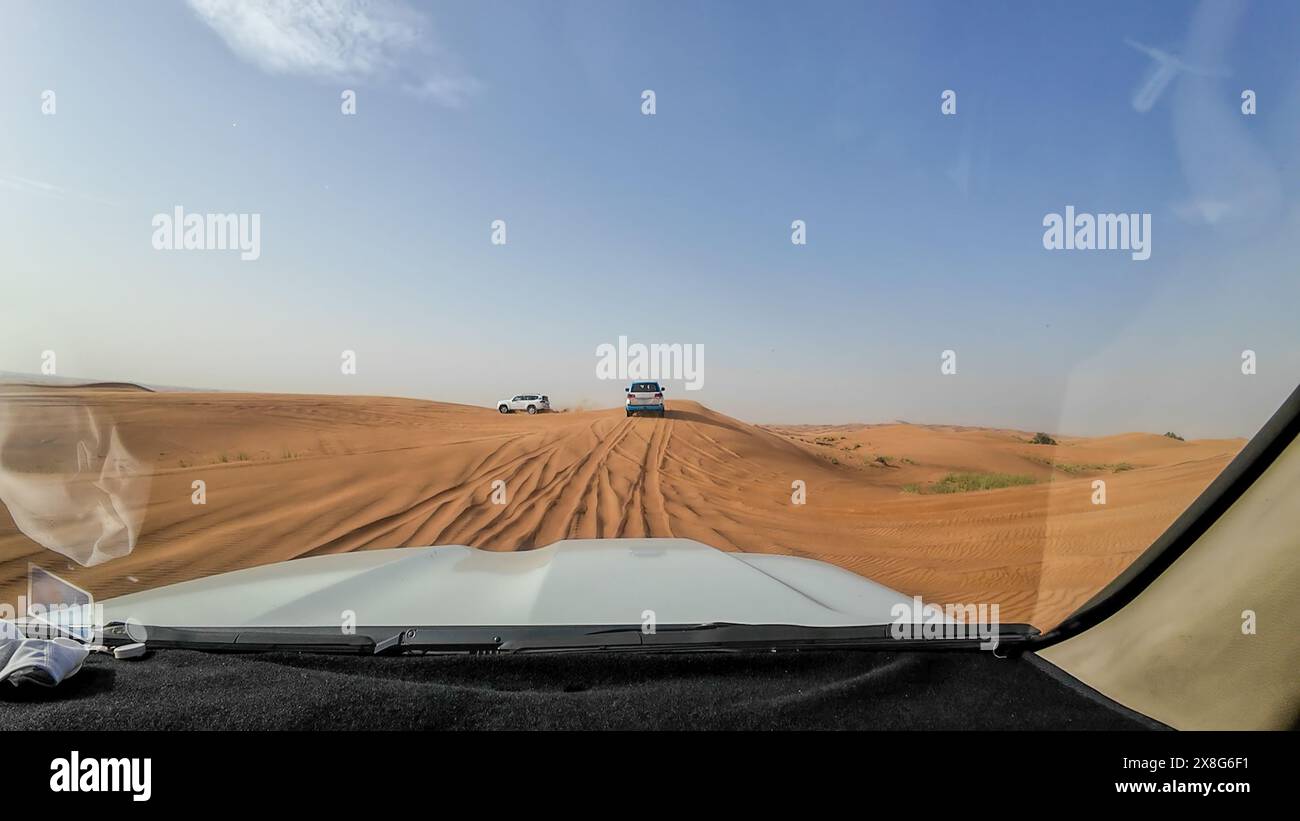 Photography of driving through desert photographed from car front seat ...