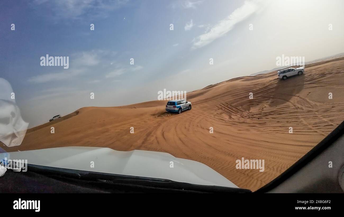 Photography of driving through desert photographed from car front seat ...