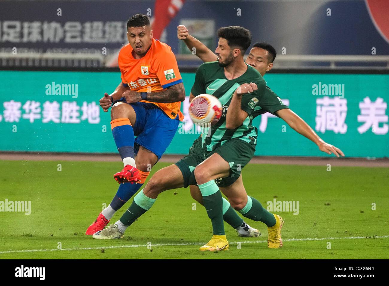 Jinan, China's Shandong Province. 25th May, 2024. Cryzan Barcelos(L) of ...