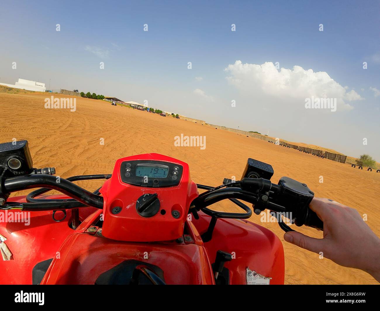 Photography of ATVs driving through red desert in United Arab Emirates ...