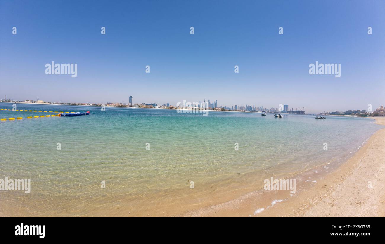 Photography of a beach in the palm Jumeirah and skyscrapers of Dubai ...