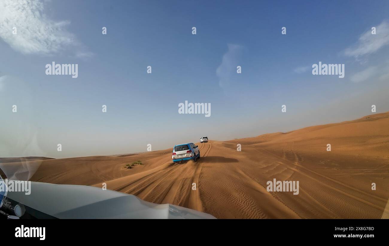 Photography of driving through desert photographed from car front seat ...