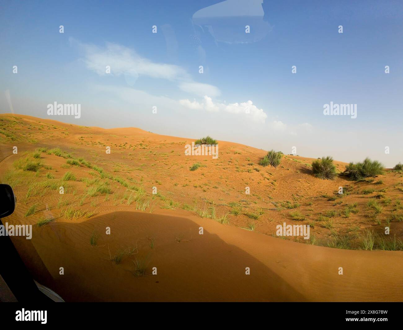 Photography of driving through desert photographed from car front seat ...
