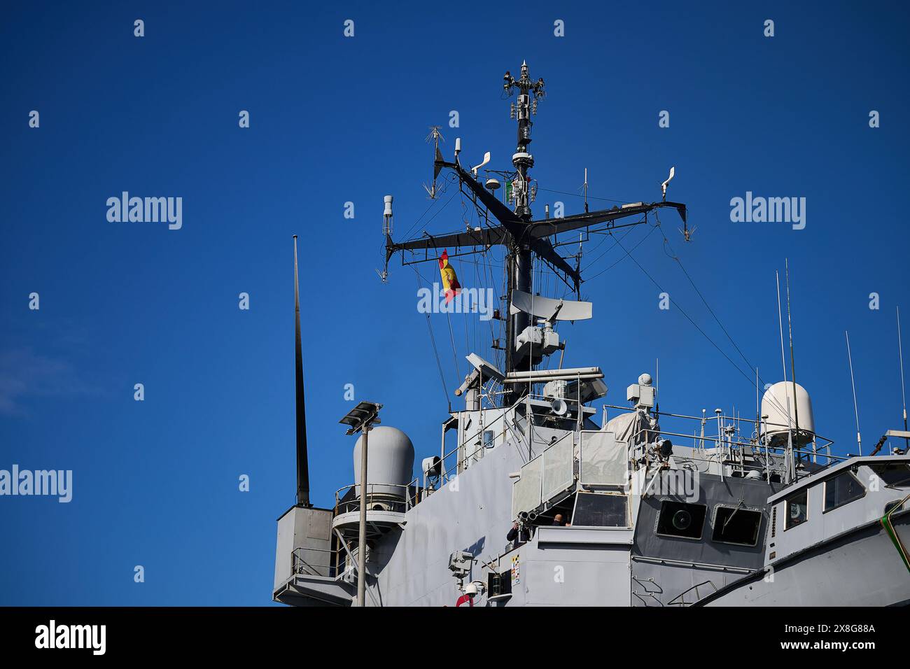 Flag of Spain flying on the communications tower of a navy ship Stock ...